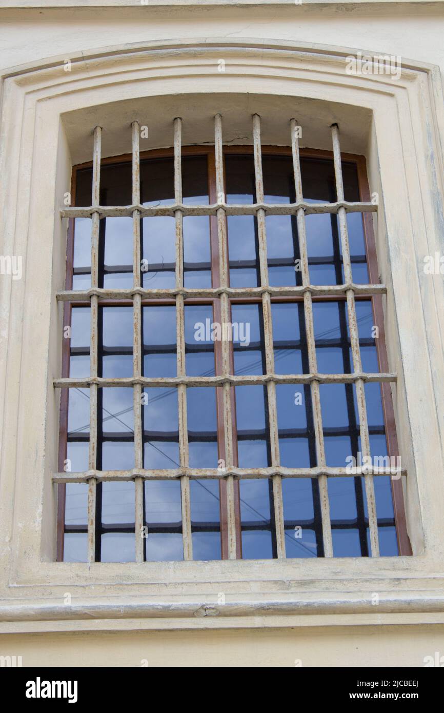 window old prison in metal bars on the windows Stock Photo - Alamy