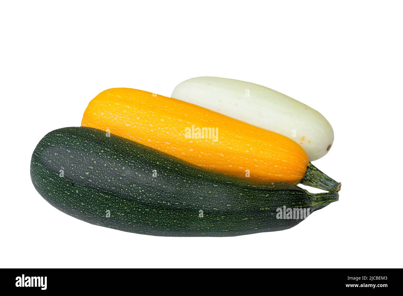 Three fresh zucchini different varieties on a white background Stock ...