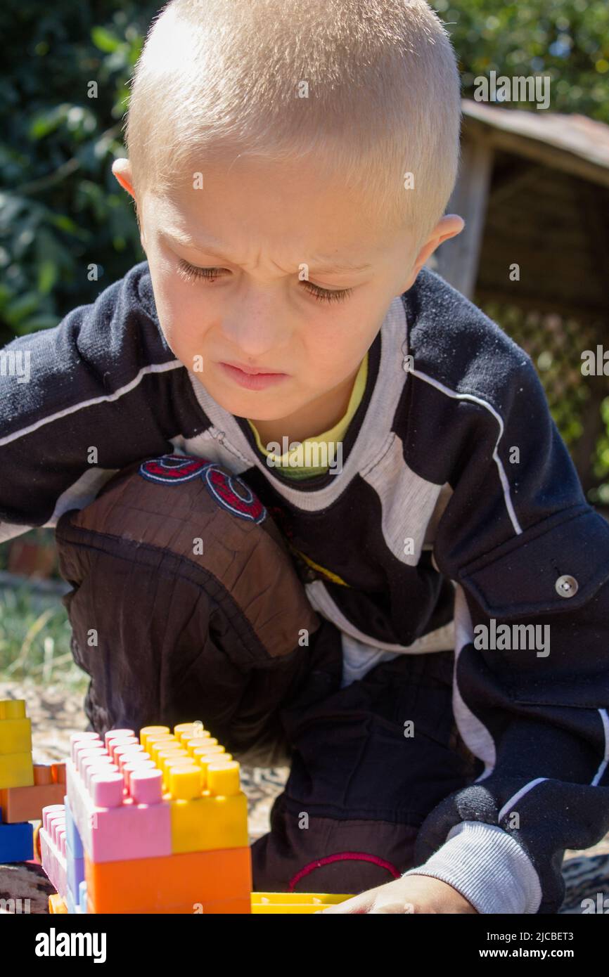 Boy playing school yard hi-res stock photography and images - Alamy