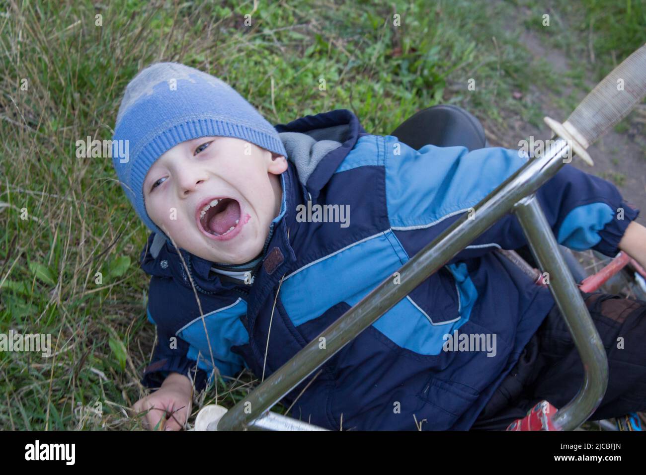 Boy falling from bike hi-res stock photography and images - Alamy