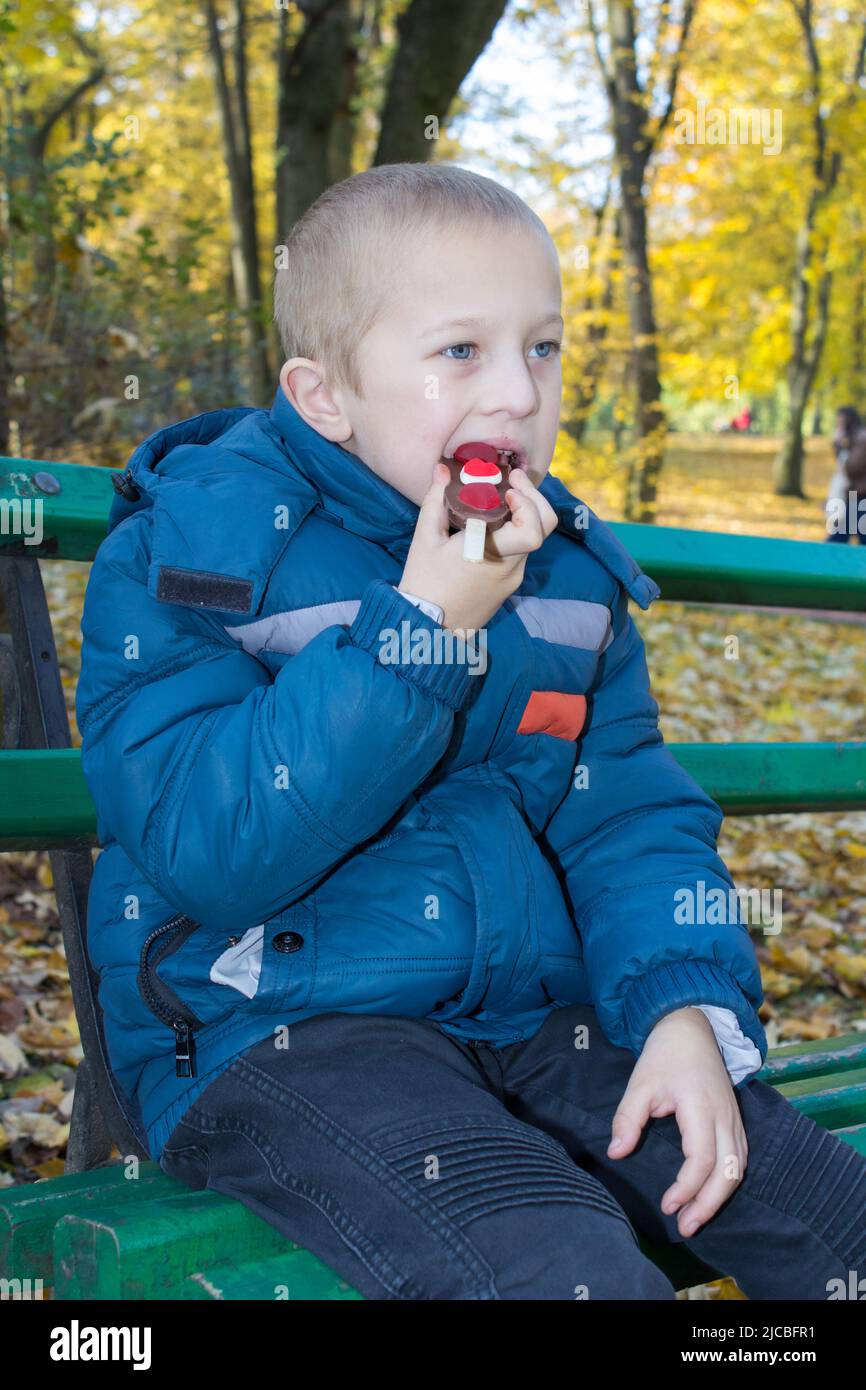 Boy laughing bench boy laughing bench hi-res stock photography and ...