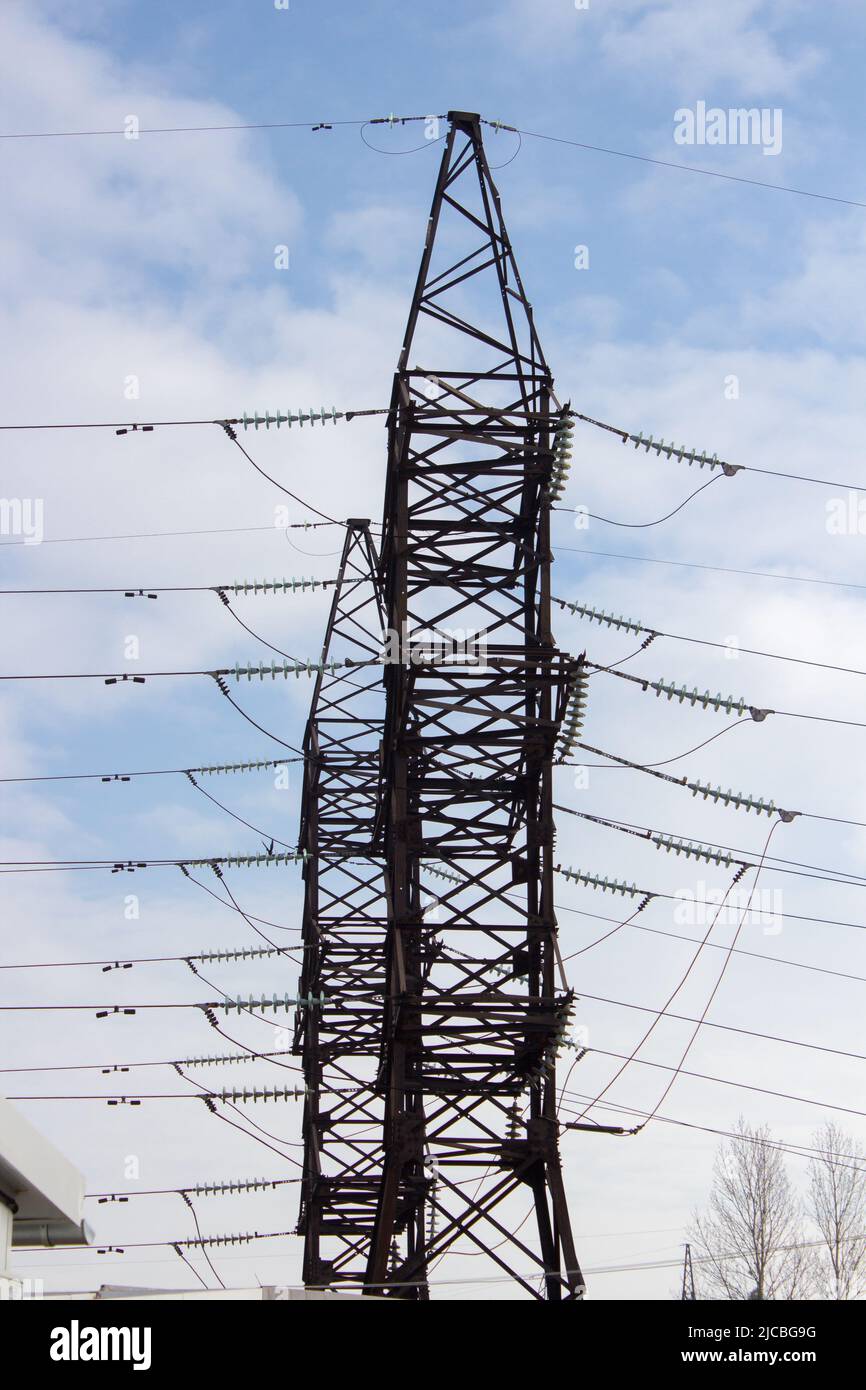 metal pillar pole Electric high against the sky Stock Photo - Alamy
