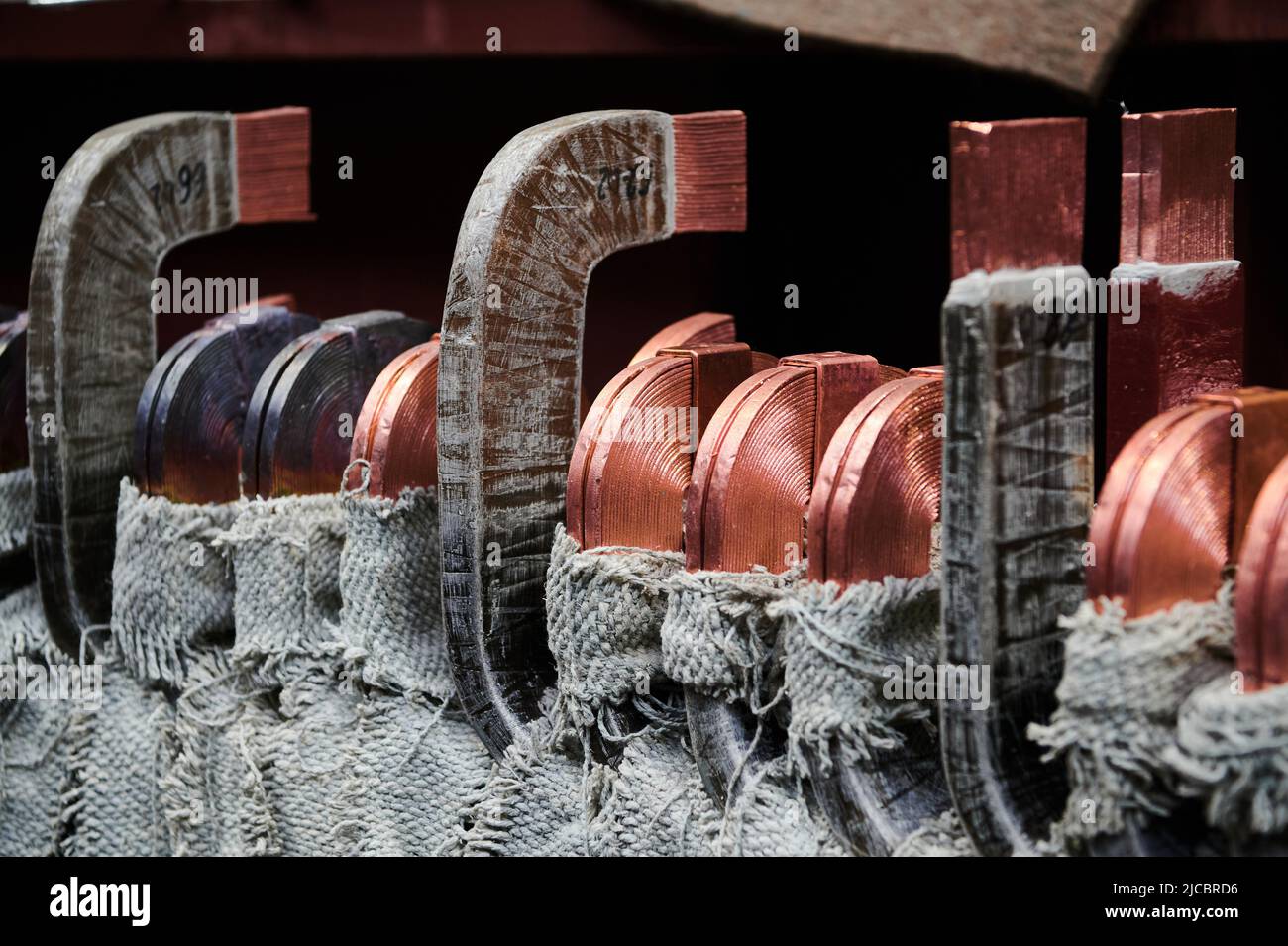 Copper bus elements of stator winding of electric motor Stock Photo - Alamy