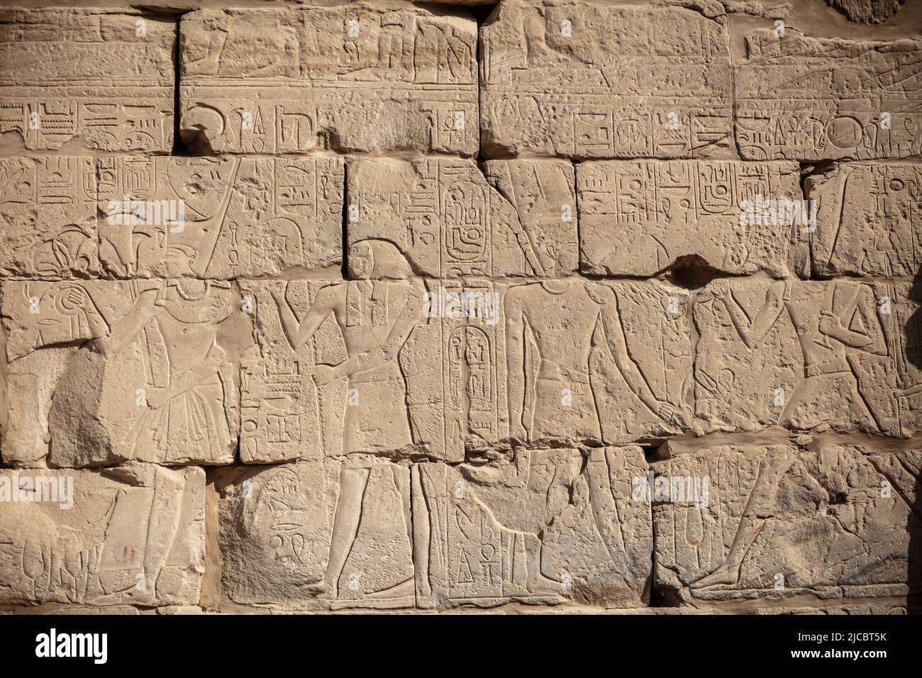 Different hieroglyphs on the walls and columns in the Karnak temple ...