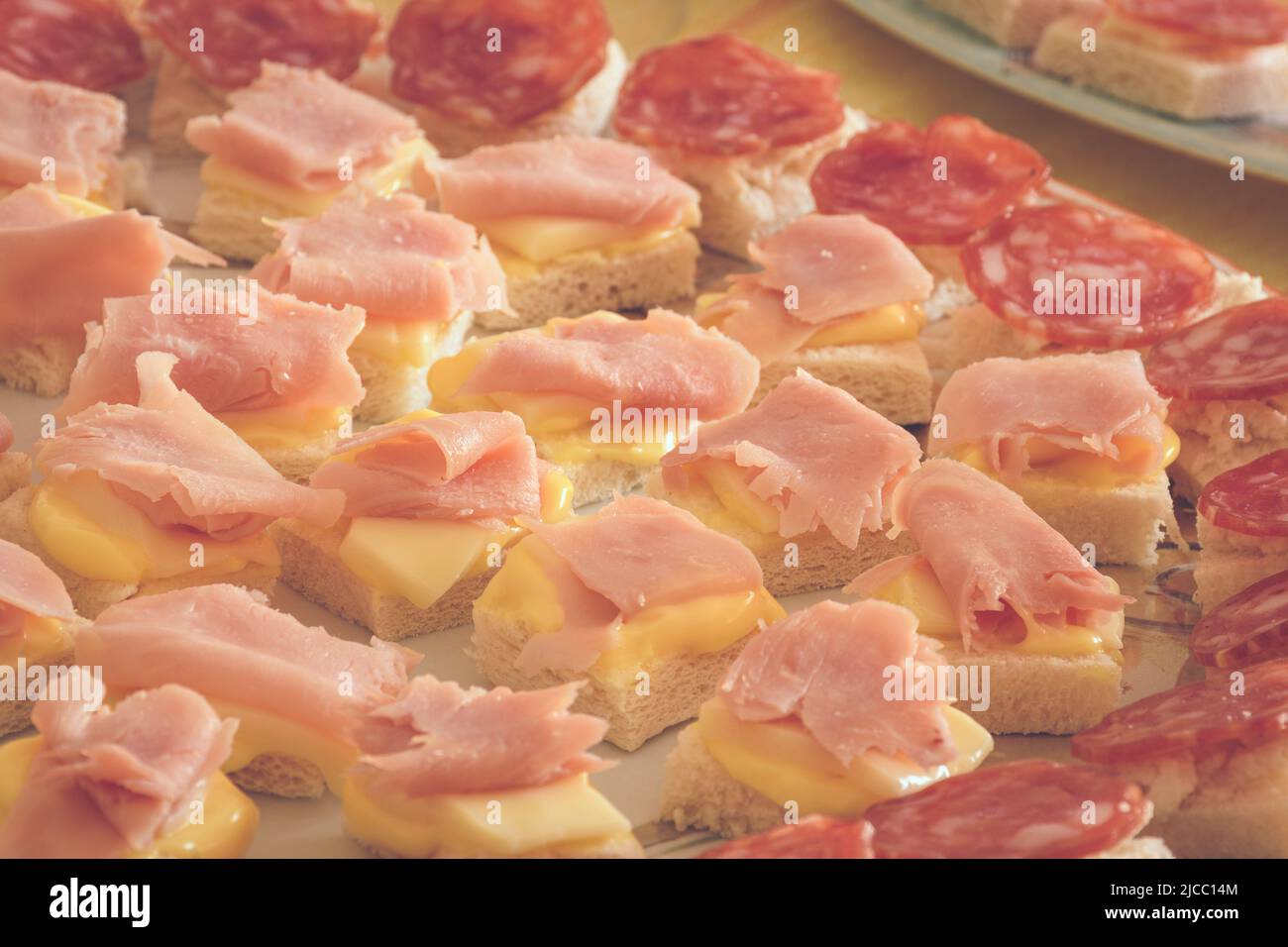 Homemade Canapes With Ham, Salami And Cheese Stock Photo - Alamy