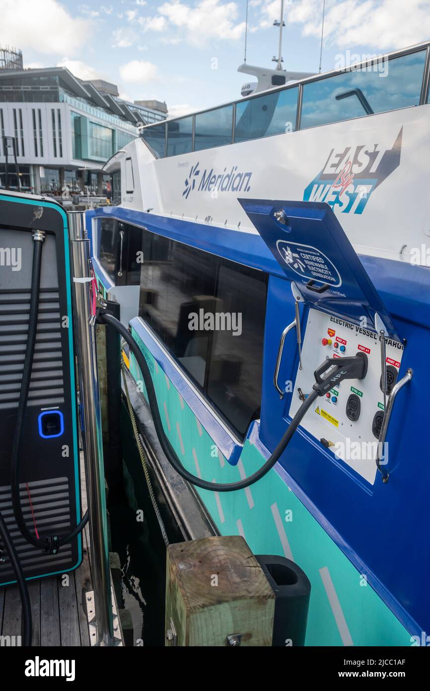 Electric powered ferry boat being charged at wharf, Wellington, North ...