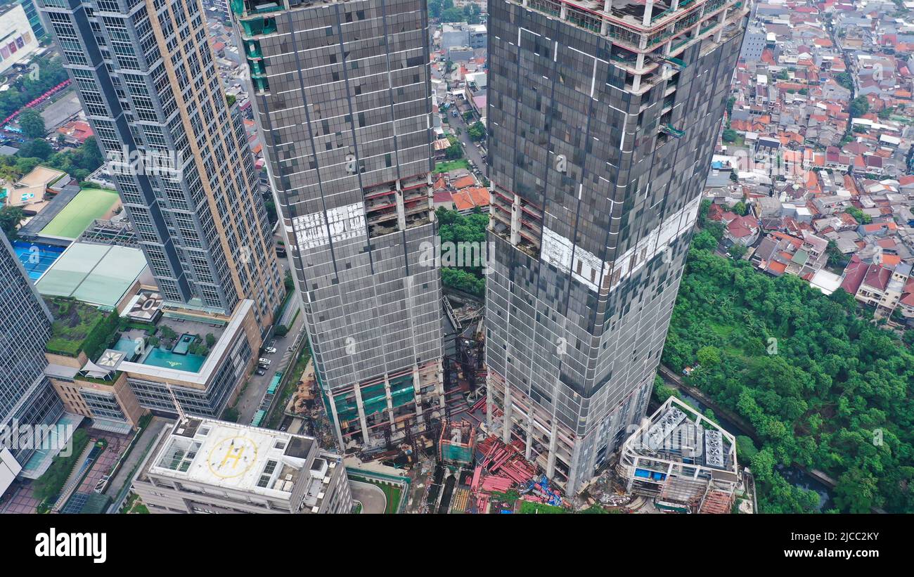Photo of skyscrapper building under construction, with scenery of other ...