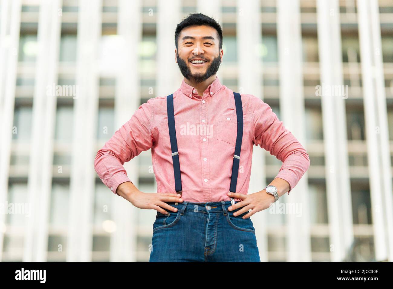 Happy chinese man in casual clothes smiling to the camera Stock Photo ...