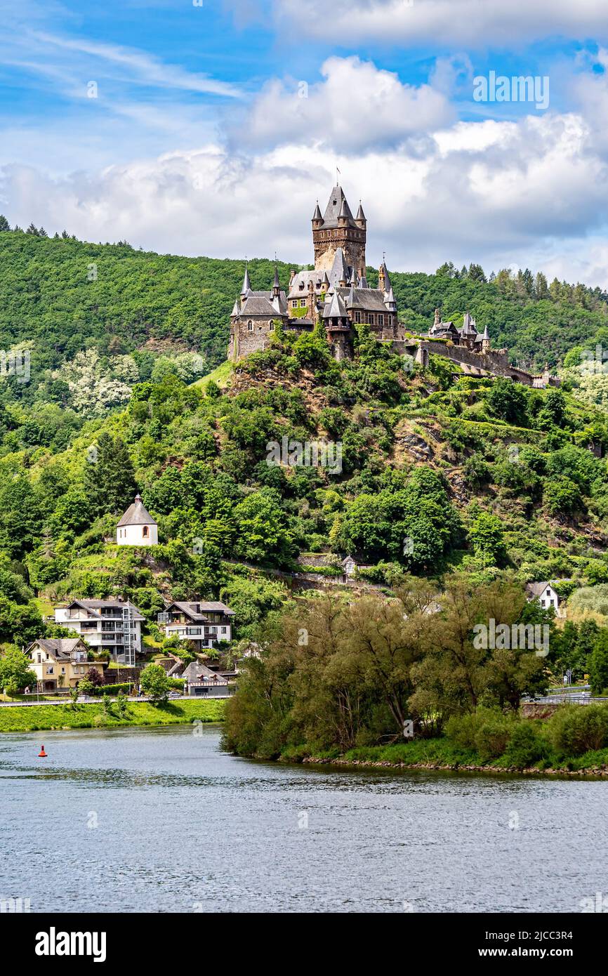 The Reichsburg Cochem (Imperial Castle Cochem) on a hill over the ...