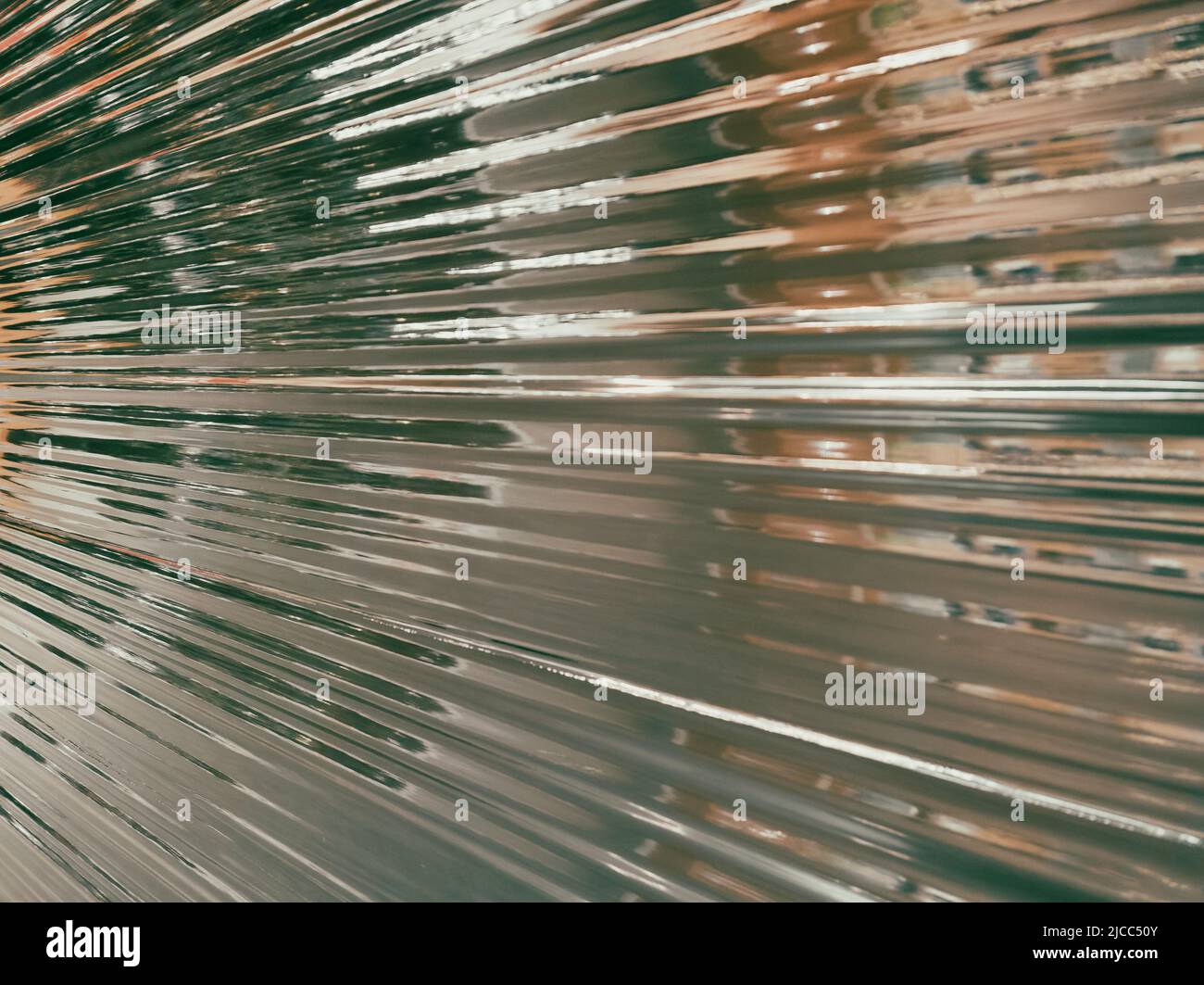 Plastic wrap background. Crumpled wrinkled plastic cellophane ...