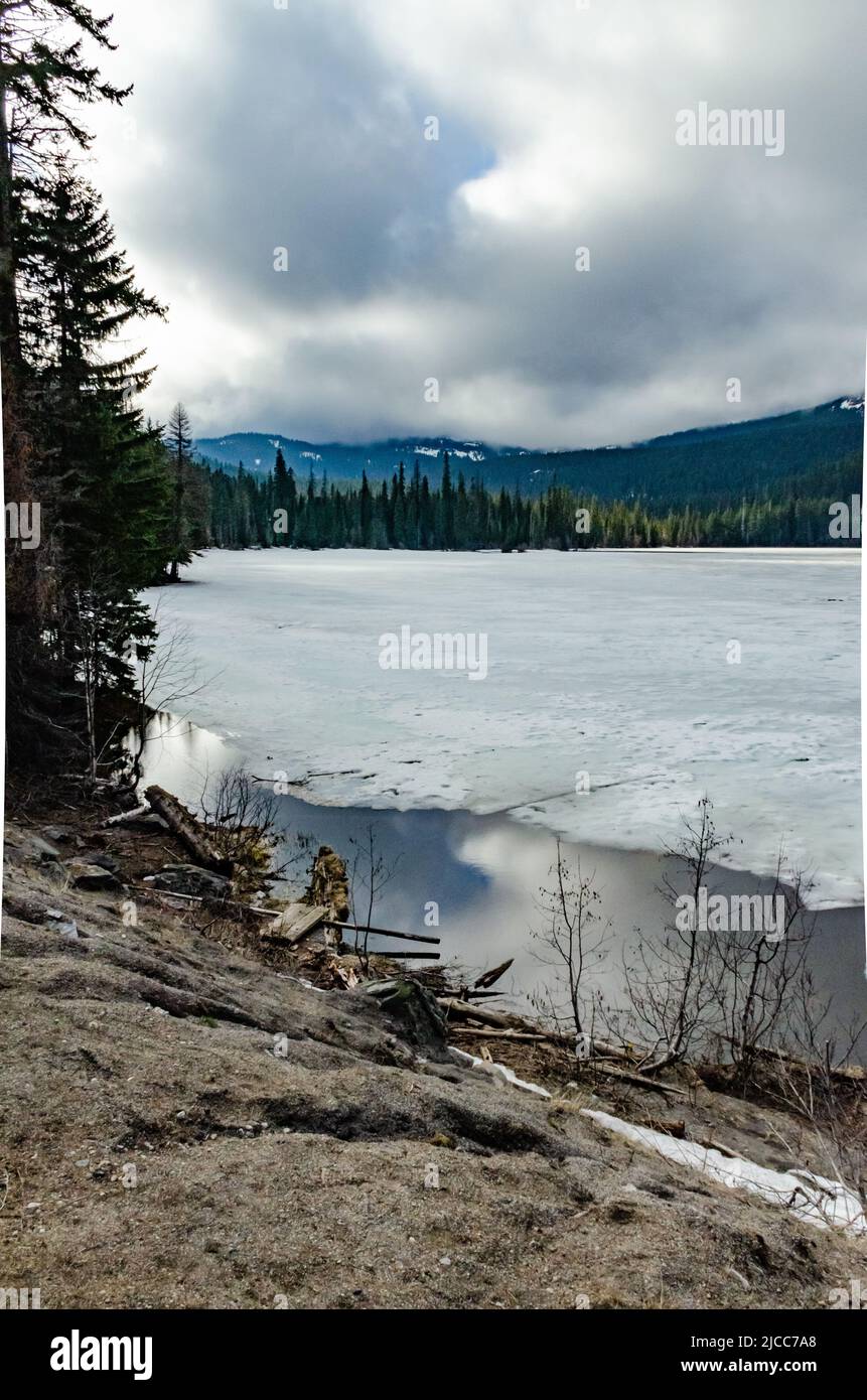 Frozen mountain lake, Washington state, USA Stock Photo - Alamy