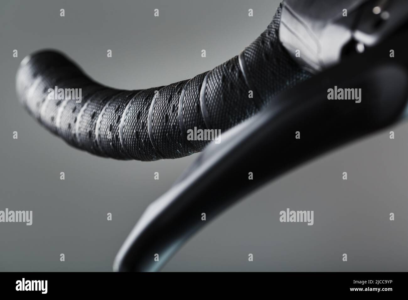Steering wheel winding with brake handle of a road bike close-up on a ...