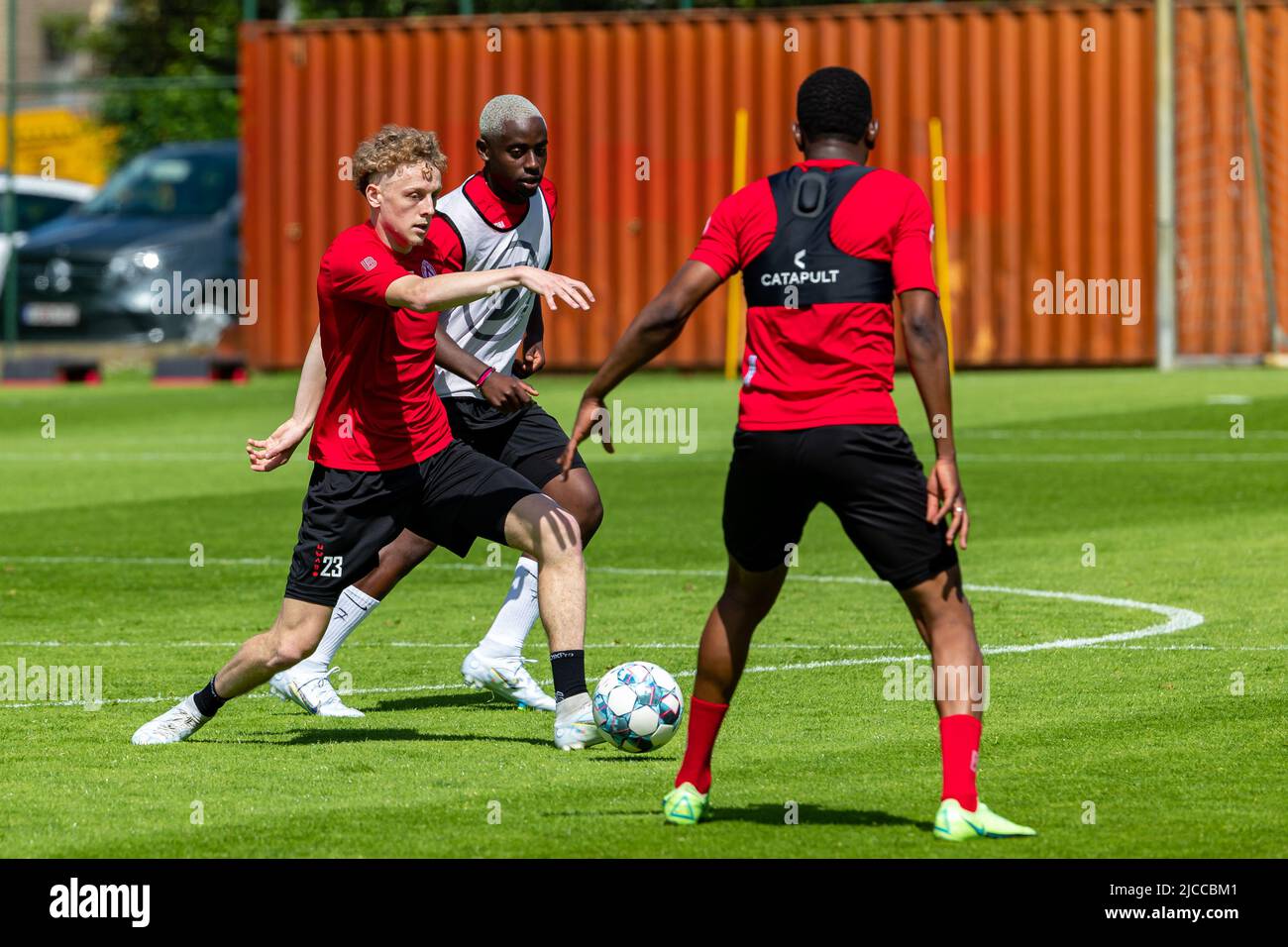 Kortrijk's new player Dion De Neve and Kortrijk's Pape Habib Gueye fight for the ball during the ...