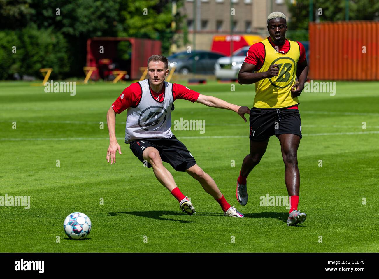 Kortrijk's new player Jimmy Tabidze and Kortrijk's Pape Habib Gueye fight for the ball during ...