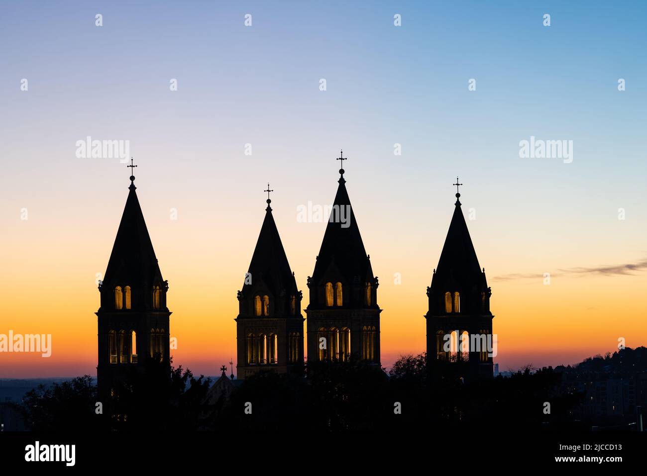 Detail of cathedral towers with sunrise in Pecs Stock Photo - Alamy