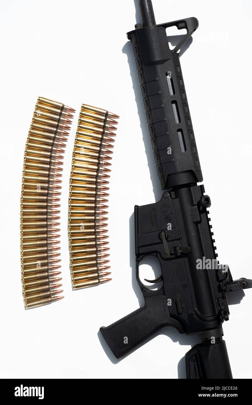 An AR-15 type rifle (without a magazine) and 60-rounds of 5.56mm ammo ...