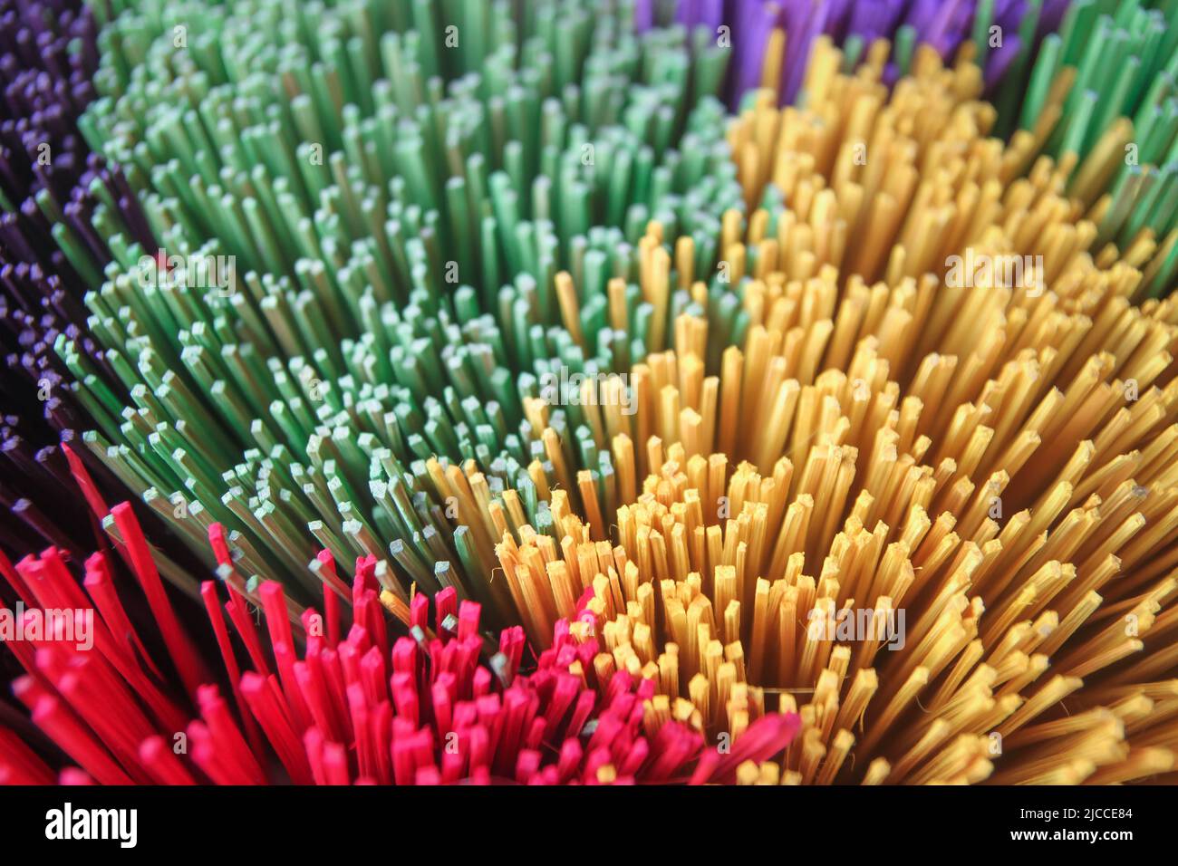 Bundles of abstract multi-colored bamboo sticks with high angle view ...