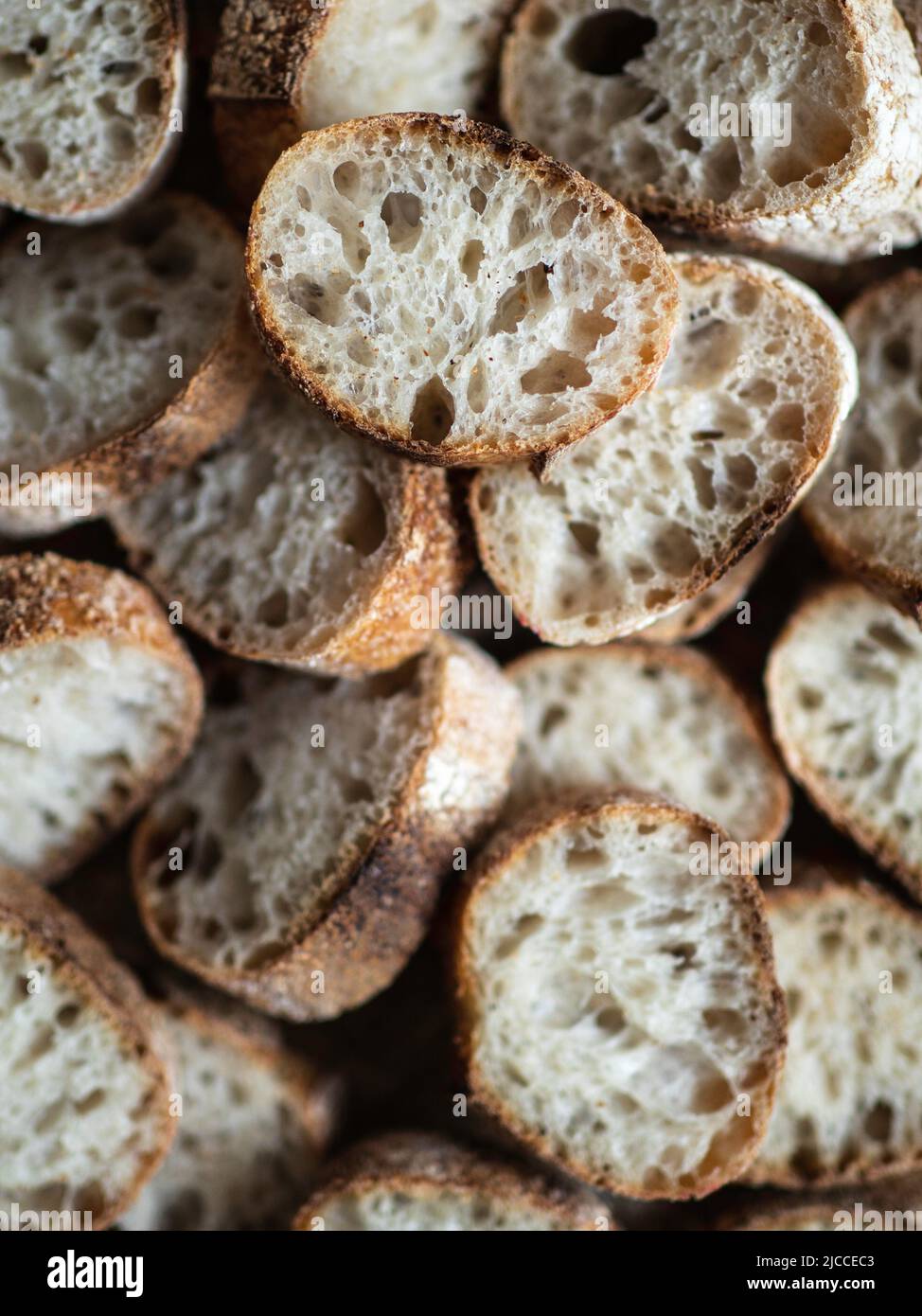 Texture photo with many slices of baguette close up Stock Photo - Alamy
