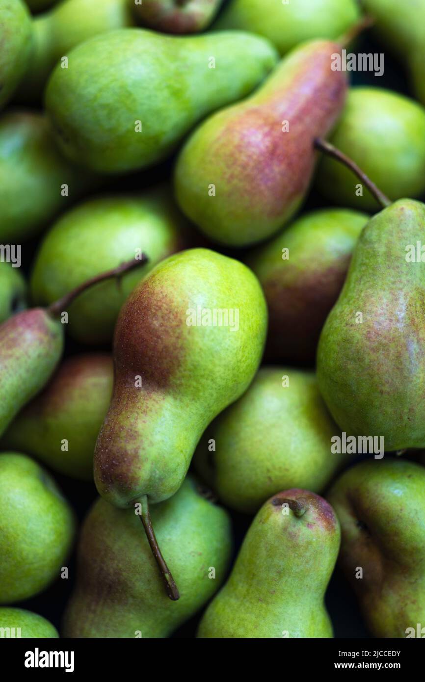 Textural photo with many sweet pears close up Stock Photo - Alamy