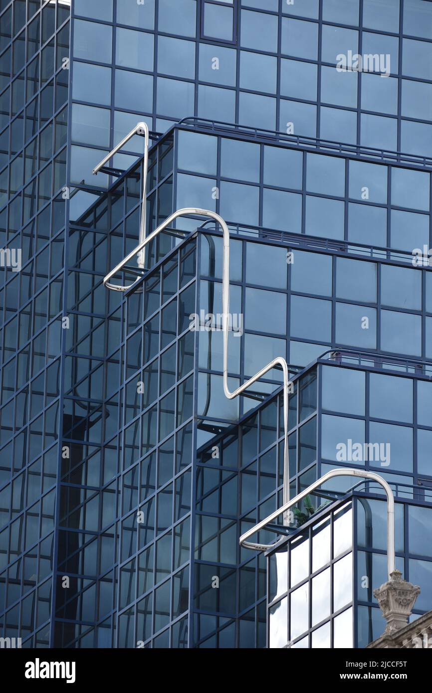 Glass building with stainless steel window cleaning rail Stock Photo ...