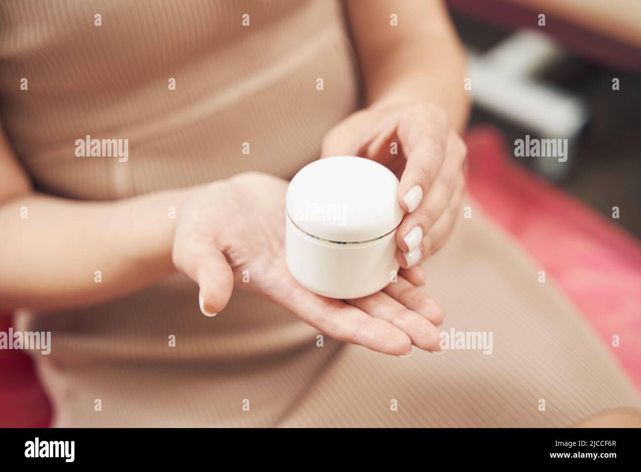 Beautiful female arms demonstrating organic cosmetic product Stock ...