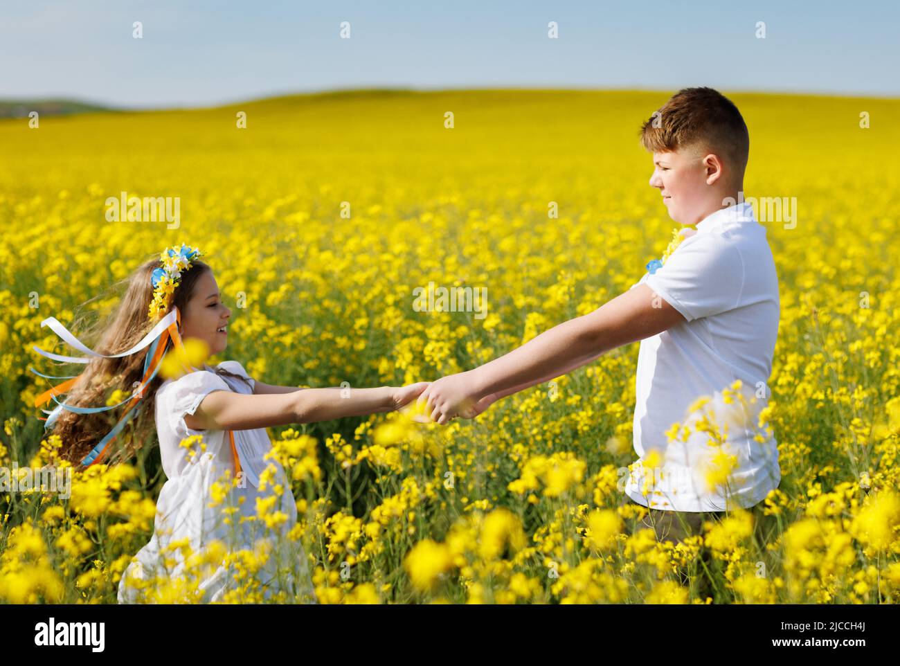 Cheerful joyful teenagers: older brother and laughing sister with ...