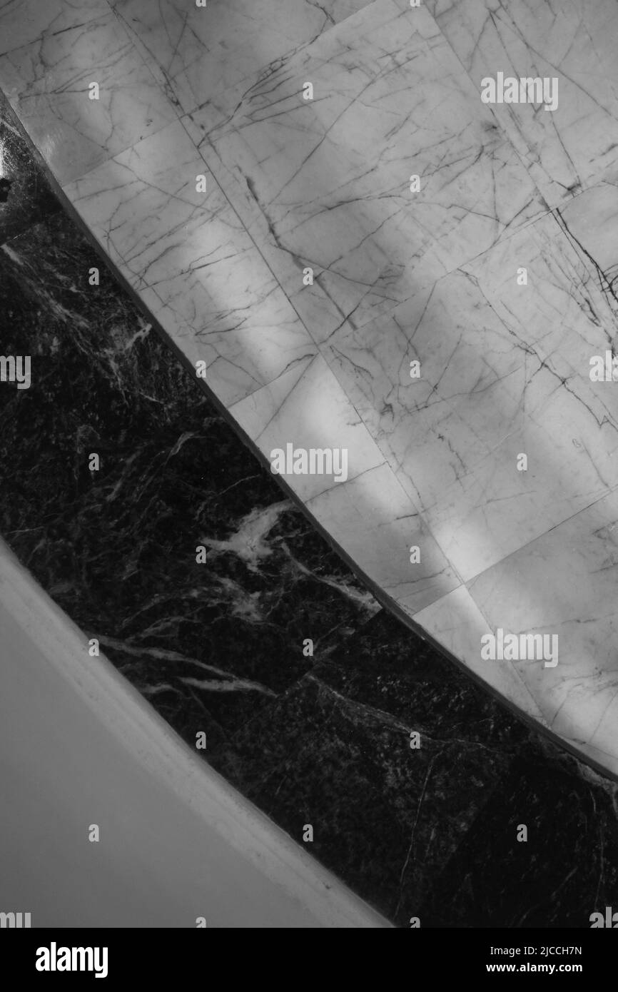 A beautiful top view of a marble floor with a simple variation in black ...