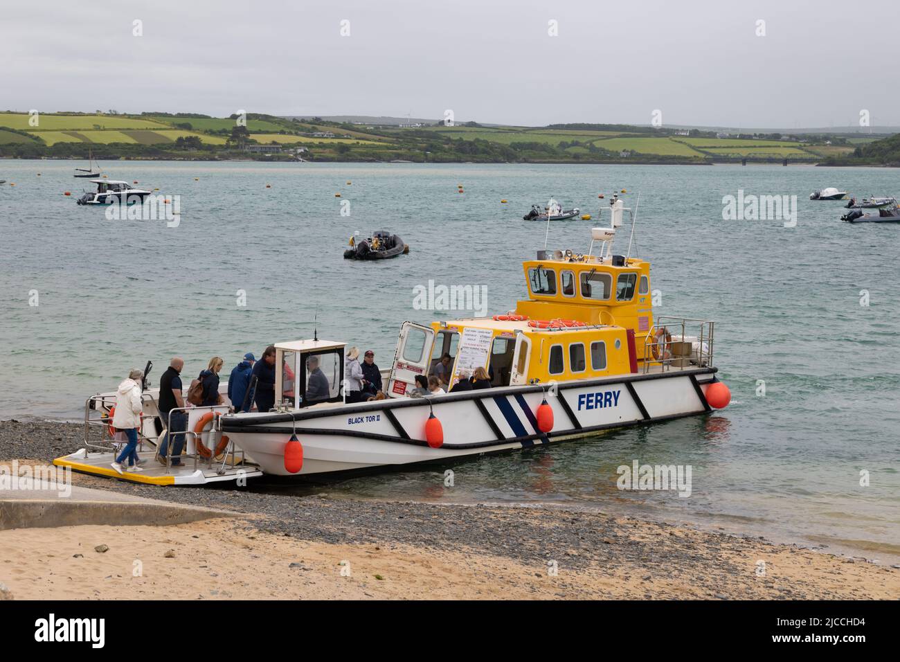 The Rock to Port Issac passenger ferry. Passengers getting on board ...