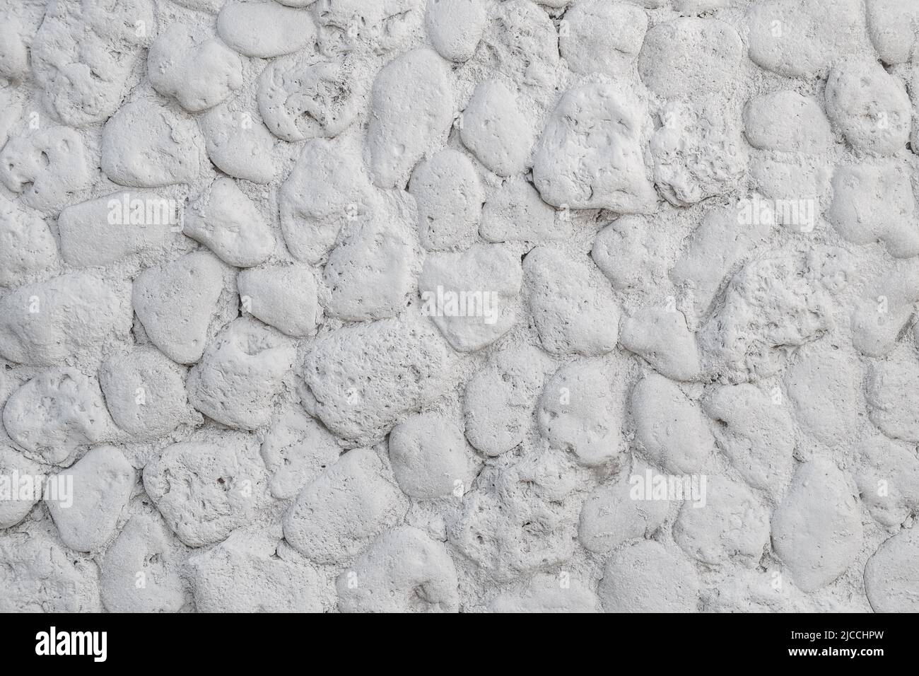White wall made of natural stone. Texture light stone background Stock ...