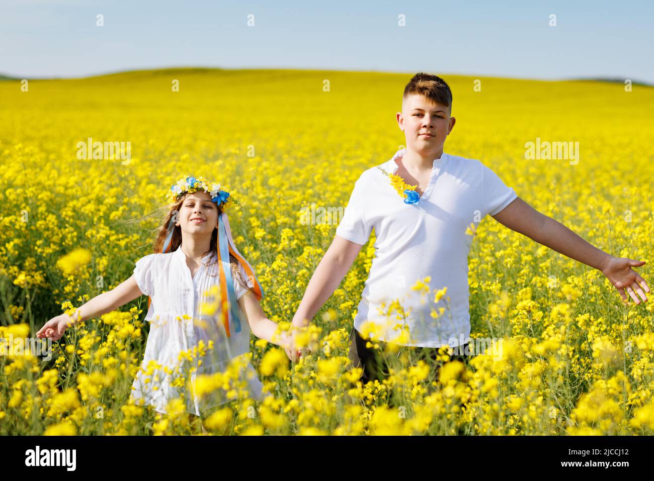 Cheerful joyful teenagers: older brother and laughing sister with ...