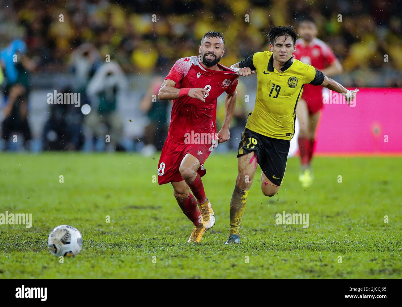 Muhammad Akhyar Rashid (R) of Malaysia and Mohamed Jasim Marhoon of ...