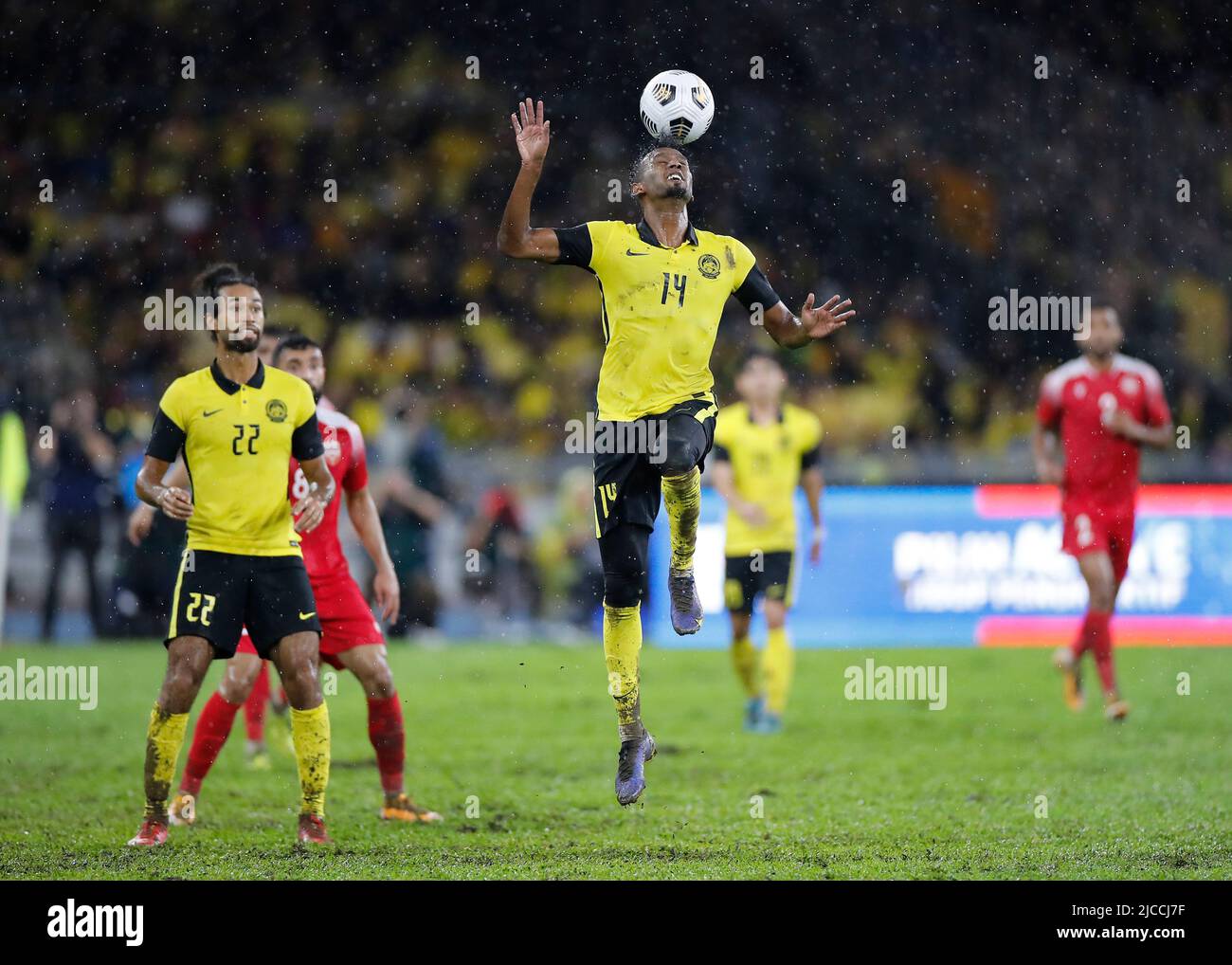 Mohamad Syamer Kutty (C) of Malaysia in action during the AFC Asian Cup ...