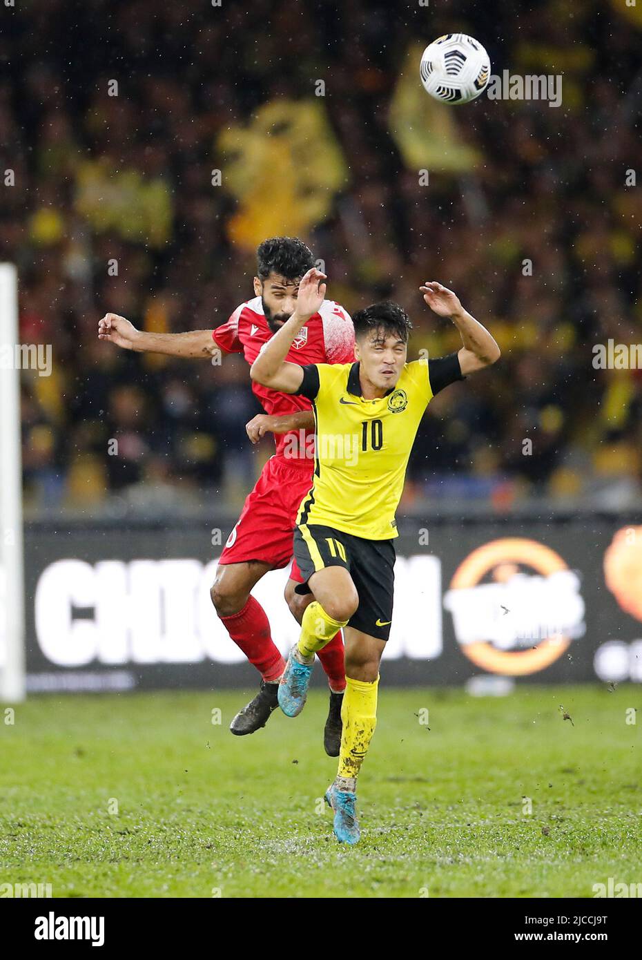Nazmi Faiz (R) of Malaysia and Jasim Ahmed Alshaikh of Bahrain in ...