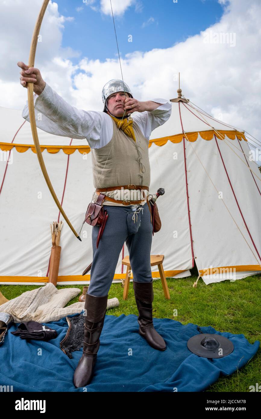 London, UK. 12 June 2022. Guy Huckle, a re-enactor playing a retinue ...