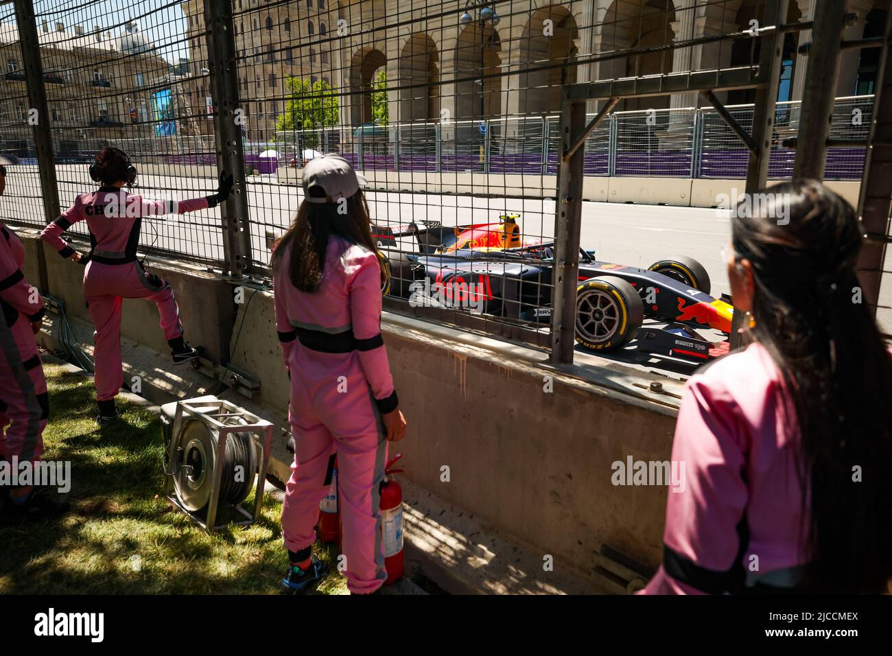The women only marshals post alongside the track during the 6th round ...