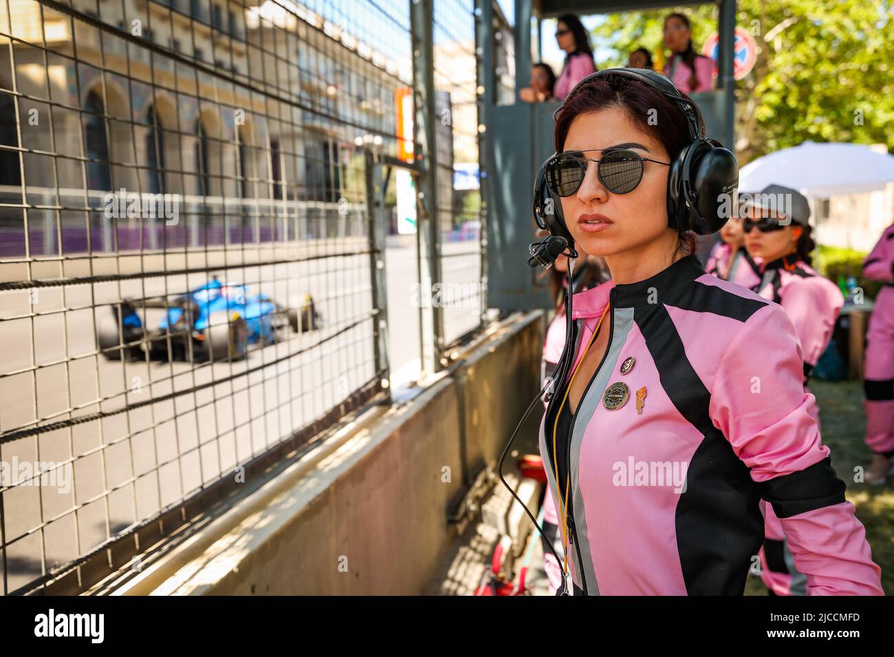 The women only marshals post alongside the track during the 6th round ...