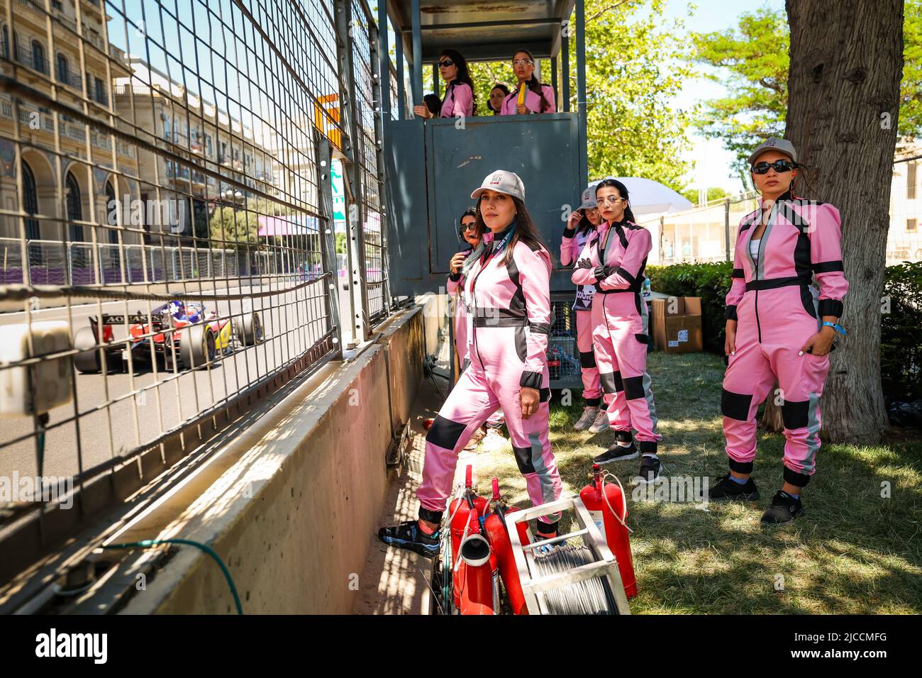 The women only marshals post alongside the track during the 6th round ...