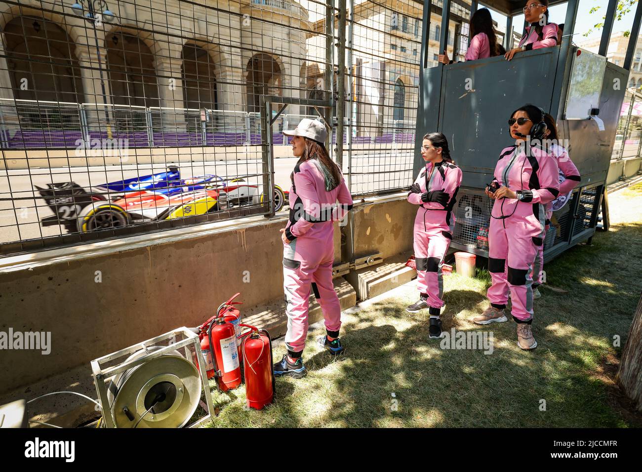 The women only marshals post alongside the track during the 6th round ...