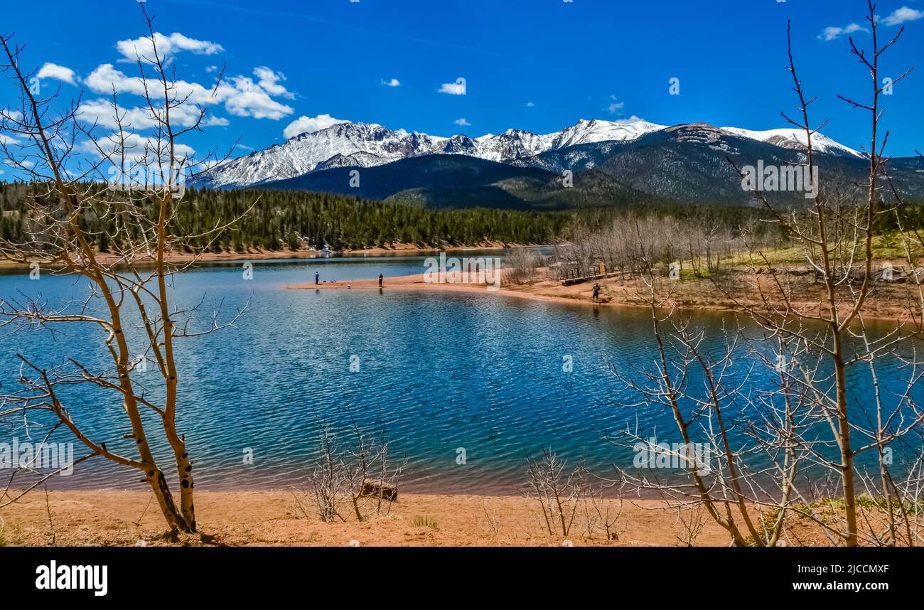 Crystal Creek reservoir near snow-capped mountains Pikes Peak Mountains ...