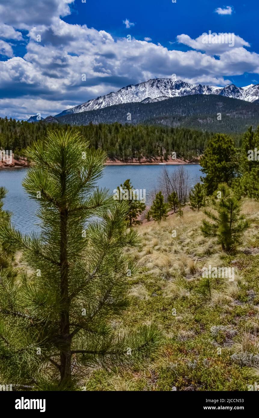 Crystal Creek reservoir near snow-capped mountains Pikes Peak Mountains ...