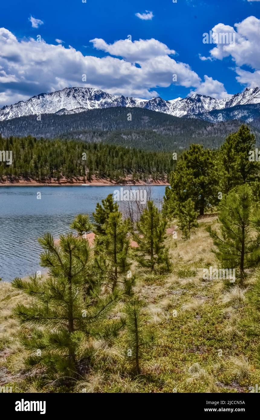 Crystal Creek reservoir near snow-capped mountains Pikes Peak Mountains ...