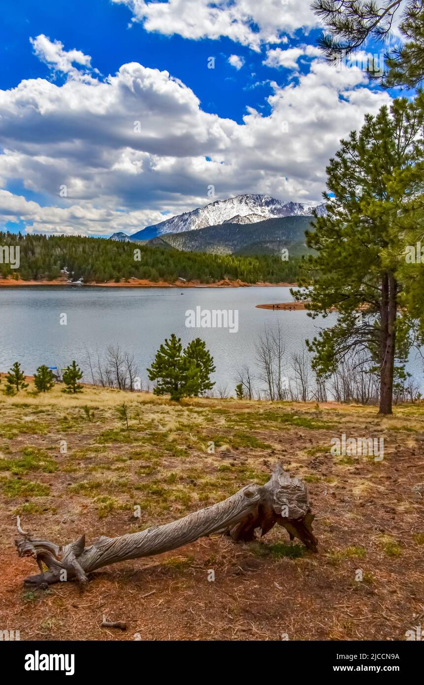 Crystal Creek reservoir near snow-capped mountains Pikes Peak Mountains ...