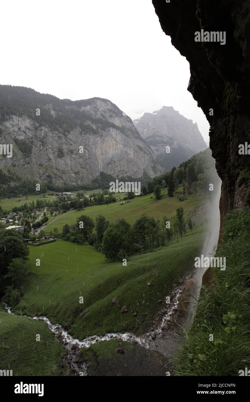 Side-view of a waterfall from a cliff, Lauterbrunnen, Switzerland Stock ...