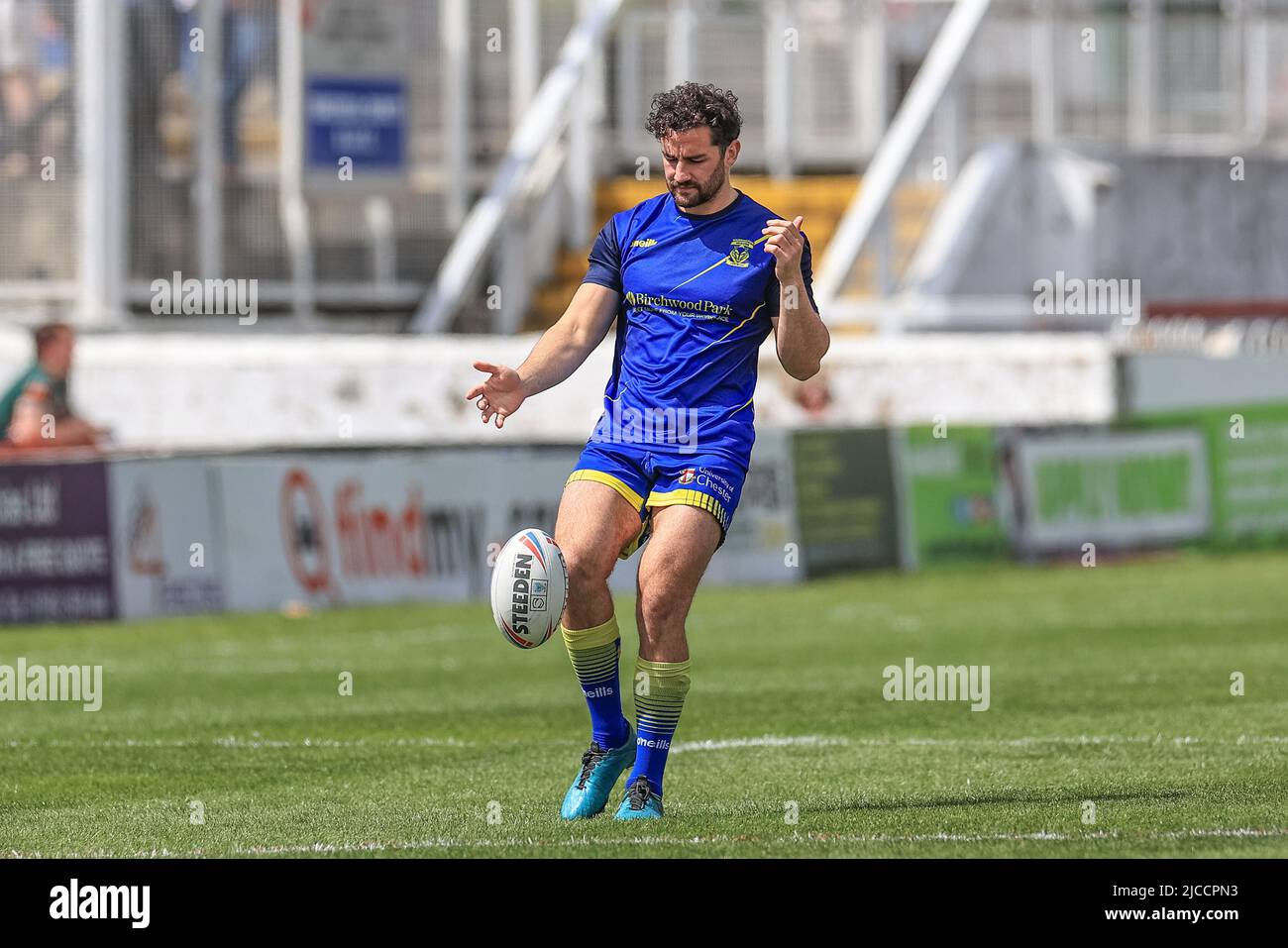 Toby King #4 of Warrington Wolves during pre-game warm up in Wakefield ...