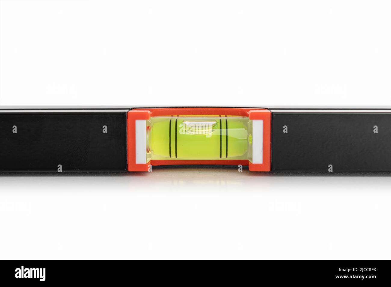 Magnetic building level isolated on white Stock Photo - Alamy