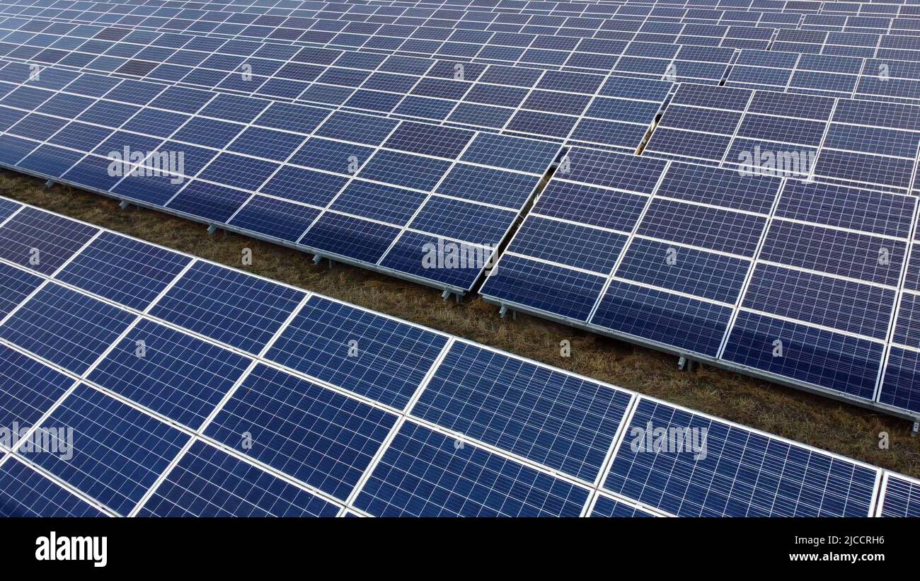 Aerial drone view flight over solar power station panels. Aerial top ...