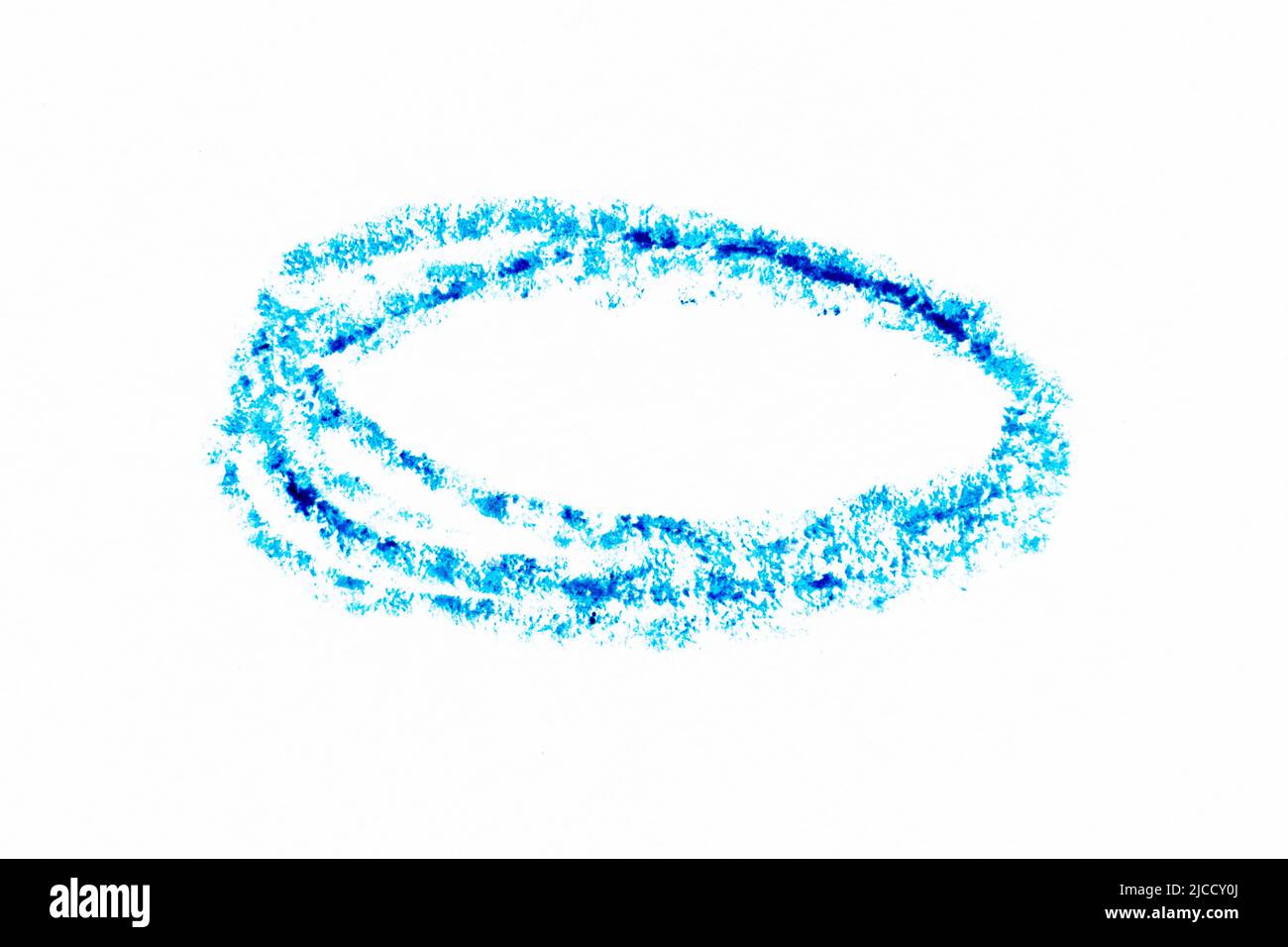 Blue color crayon hand drawing in circle or round shape on white paper ...