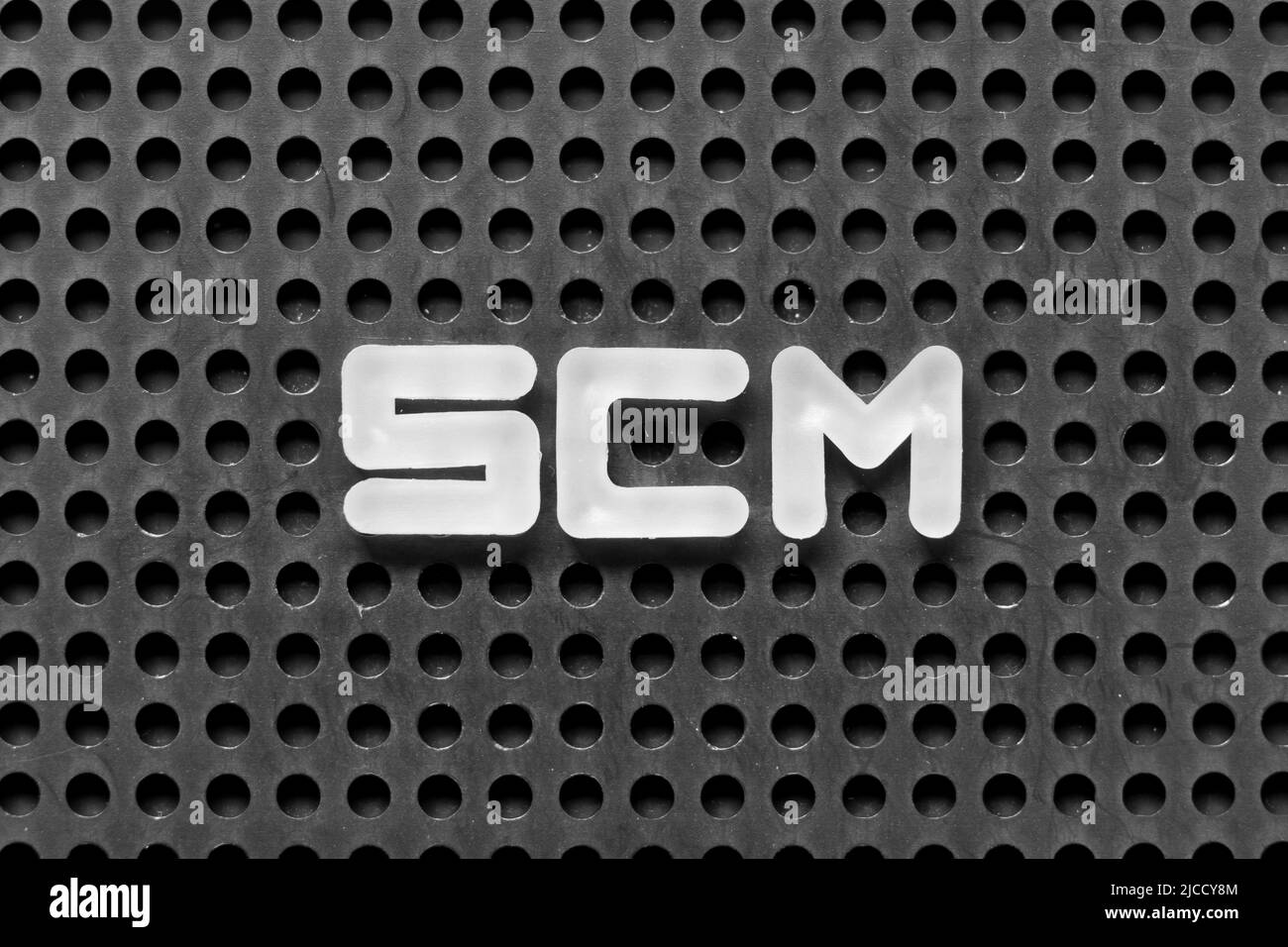 White alphabet letter in word SCM (Abbreviation of Supply chain ...