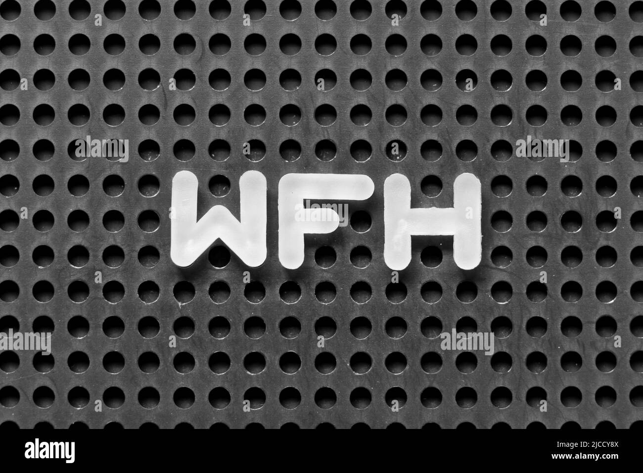 White alphabet letter in word WFH (abbrevoatopm work from home) on ...