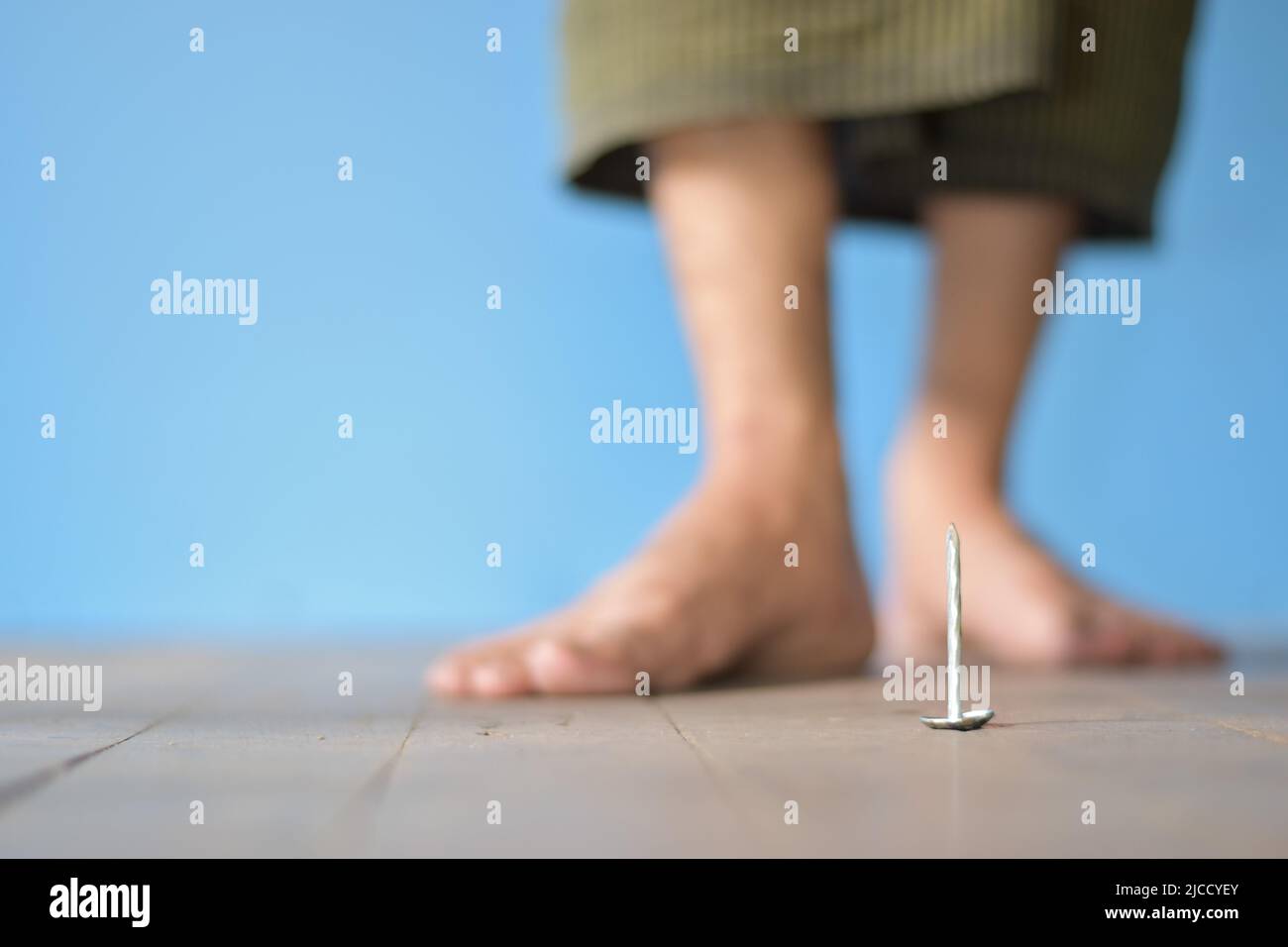 Concept of risk of nail injury and tetanus infection Stock Photo - Alamy